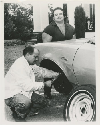 Photo of Paul Anderson lifting a car | Rogue USA