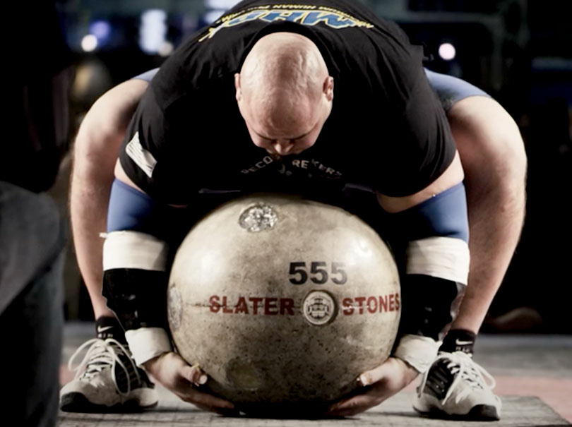 Brian Shaw — 555 lb. world record stone lift — Arnold Strongman Classic ...