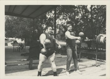 Paul Anderson and Terry Todd lifting dumbells | Rogue Fitness