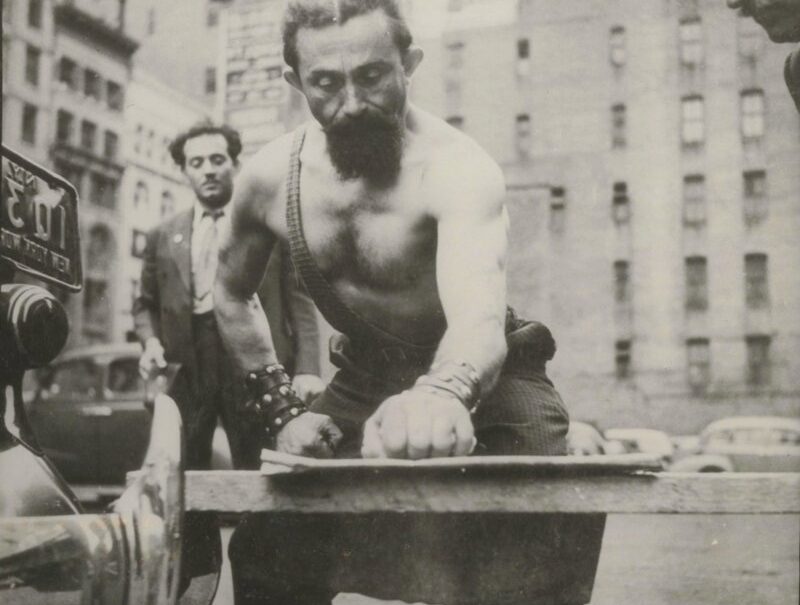 The Mighty Atom driving nail with hand | Rogue Fitness