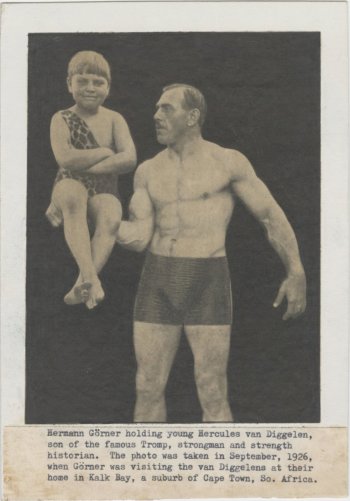 Hermann Goerner holding 112-pound Hercules van Diggelen | Rogue Fitness