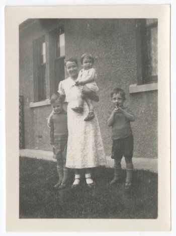 Agnes Clark posing with unidentified children | Rogue Fitness